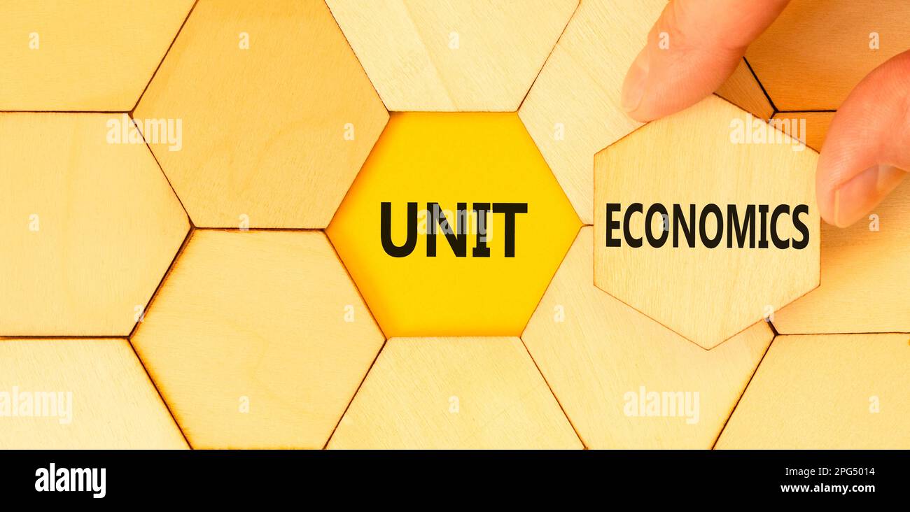 Unit economics symbol. Concept words Unit economics on puzzles ...