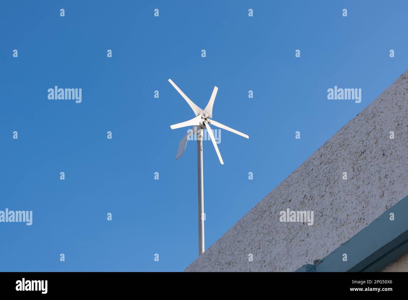 The Power generation by Wind turbine on the roof of a private home at ...