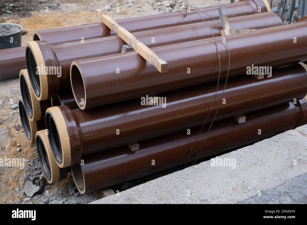 Plumbing. new Ceramic pipe heap, pile near the construction site for ...