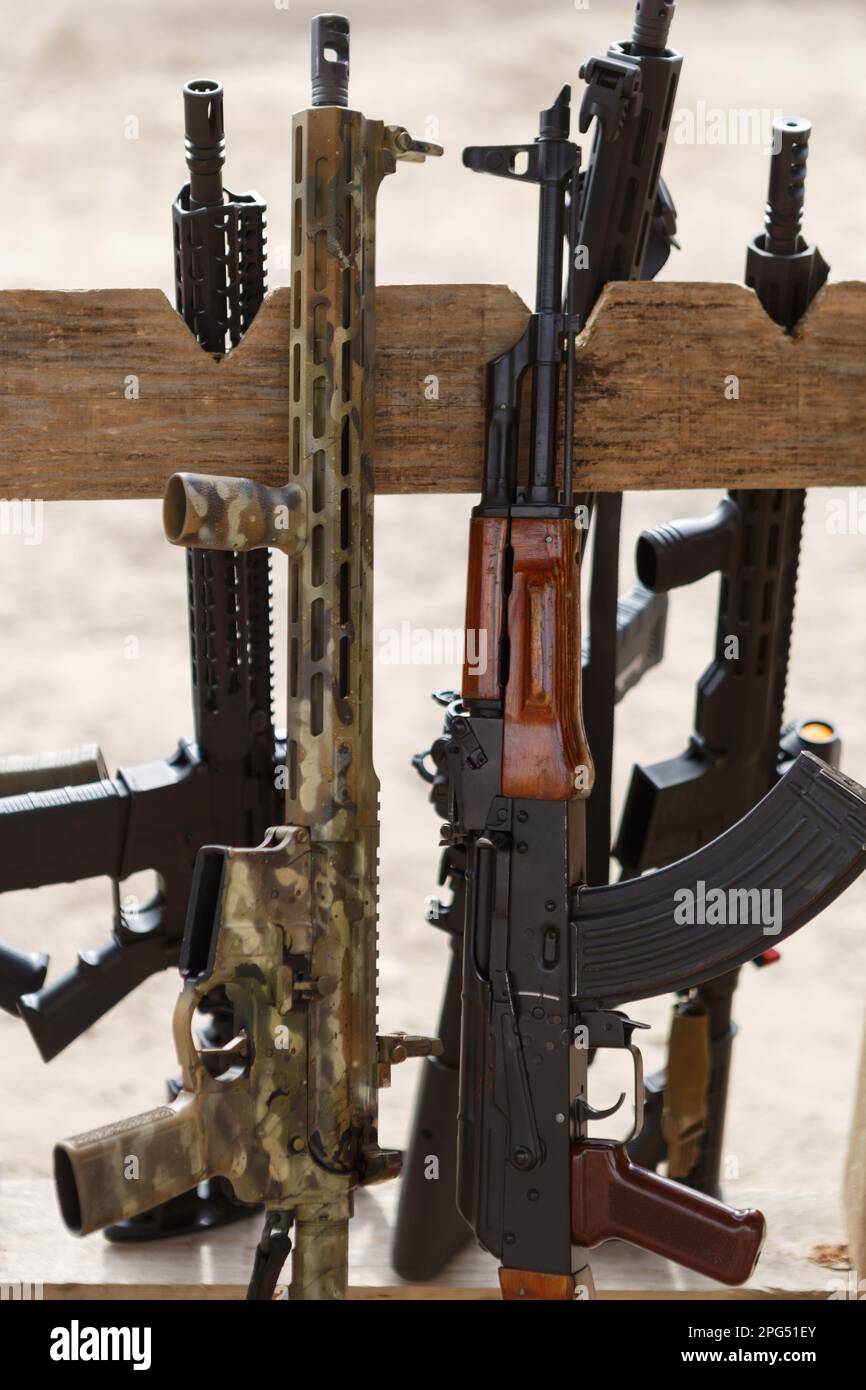Modern American 5.56mm assault rifle and Kalashnikov 5.45mm on a weapon ...