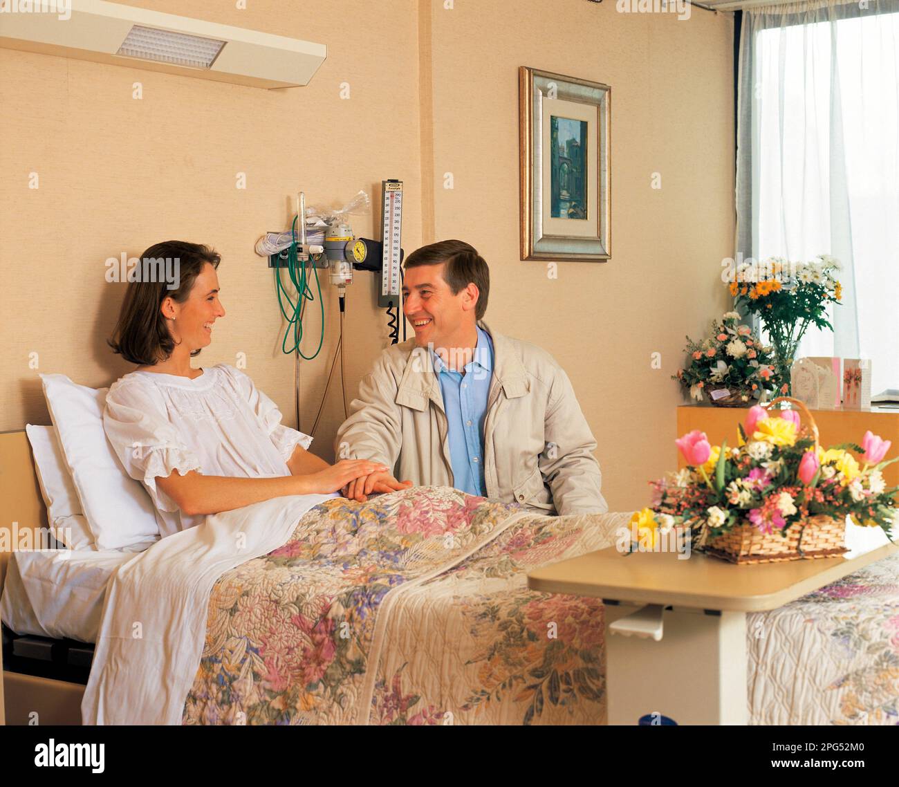 Bedside visit hospital hi-res stock photography and images - Alamy