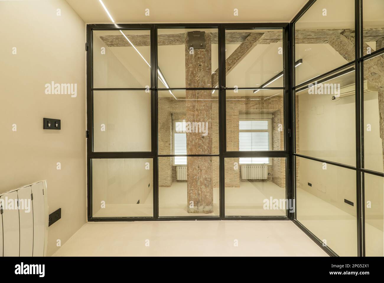 Loft apartment with vintage wooden beams and pillars, exposed brick ...