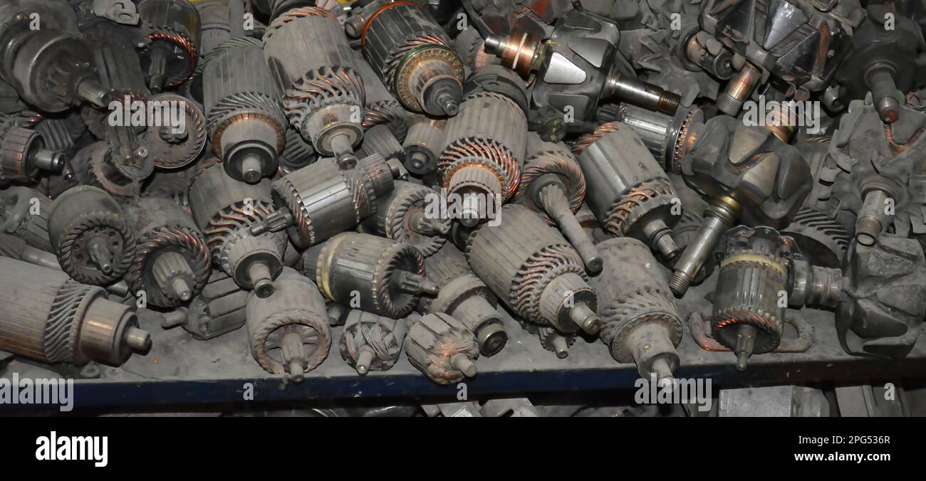 Pile of used stators - a devices used to rotate (crank) an internal ...
