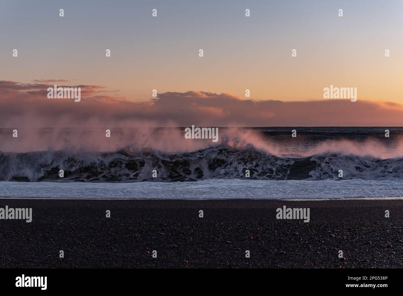 Waves black sand beach hi-res stock photography and images - Alamy