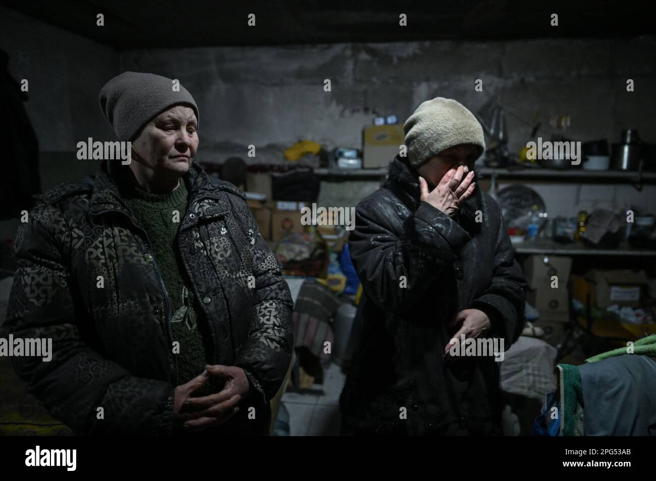 Avdiivka, Ukraine. 20th Mar, 2023. Mayorava, a Ukrainian civilian sobs ...