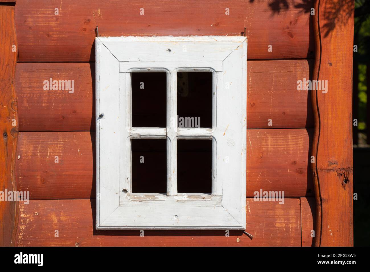 white window without glass in a wooden house for children Stock Photo ...