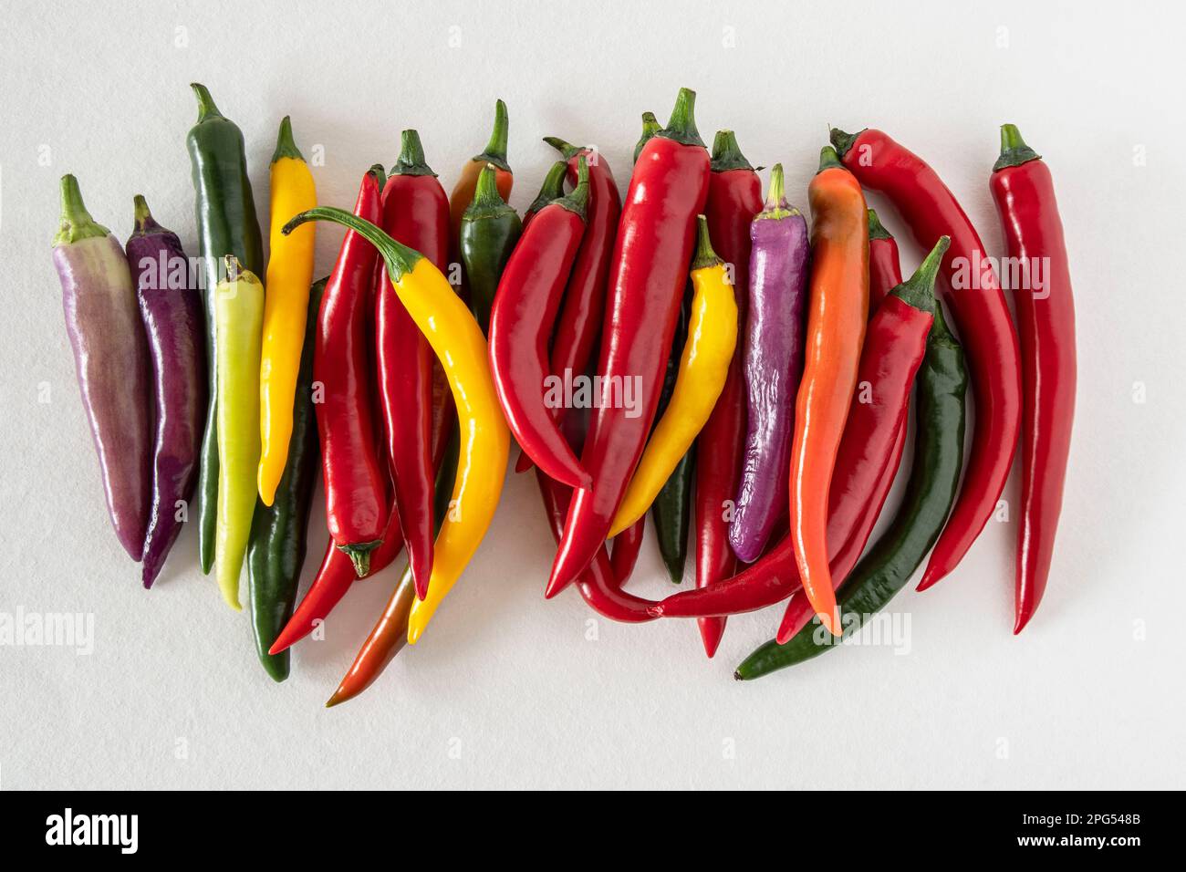 Close-up of different coloured chillies Stock Photo - Alamy