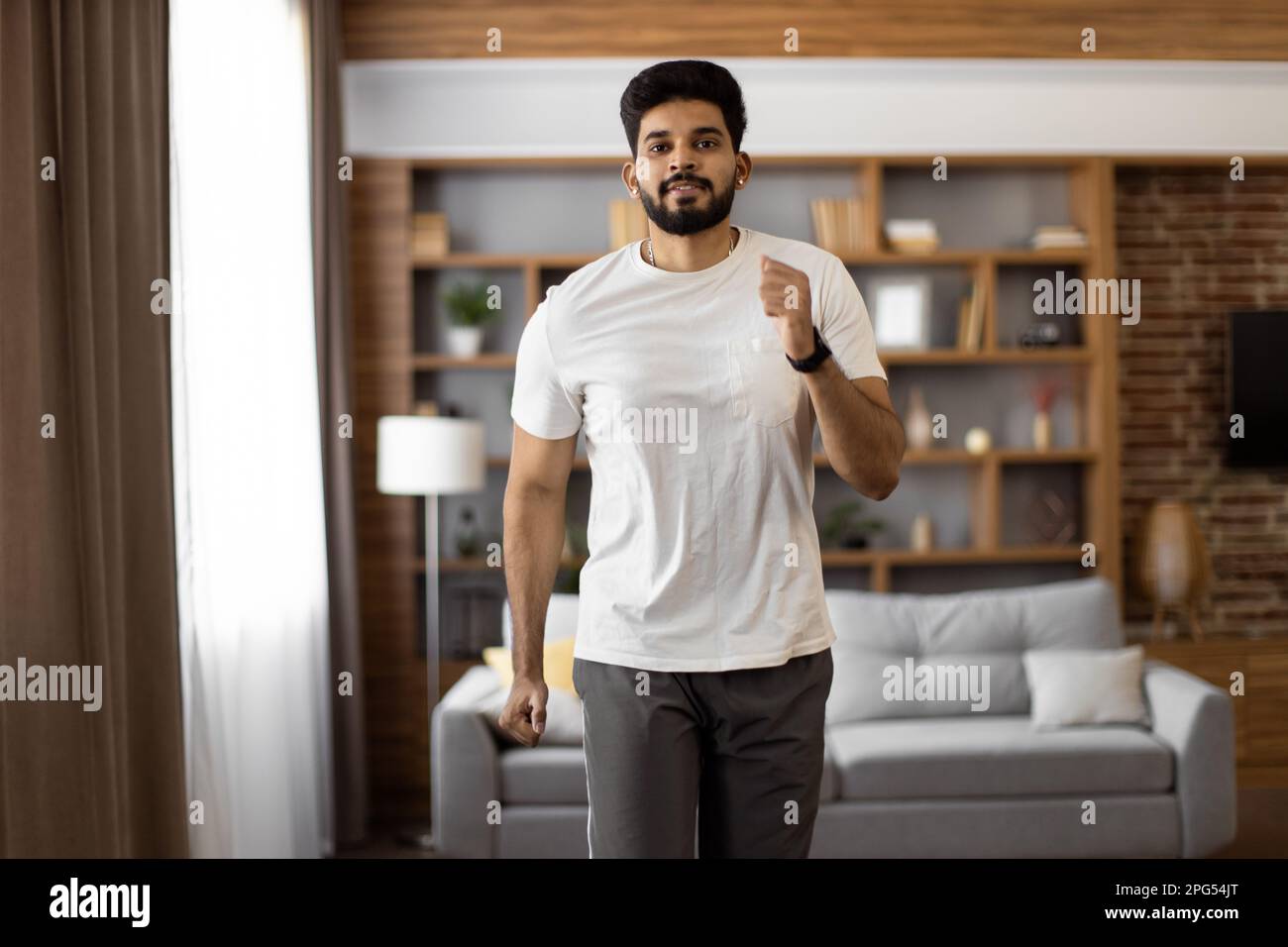 Handsome arabian man in short hi-res stock photography and images - Alamy