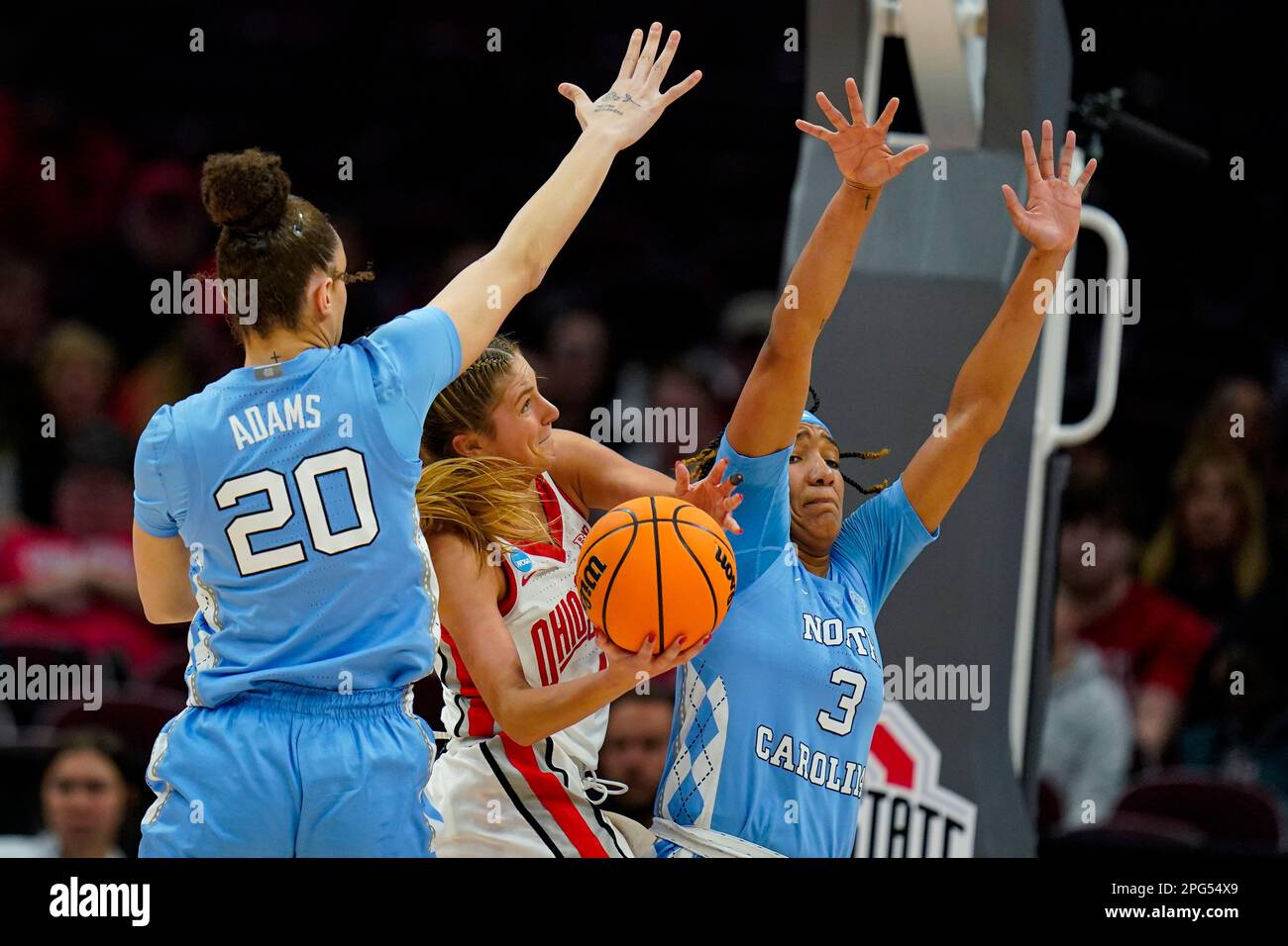 Ohio State guard Jacy Sheldon (4) shoots between North Carolina guard ...