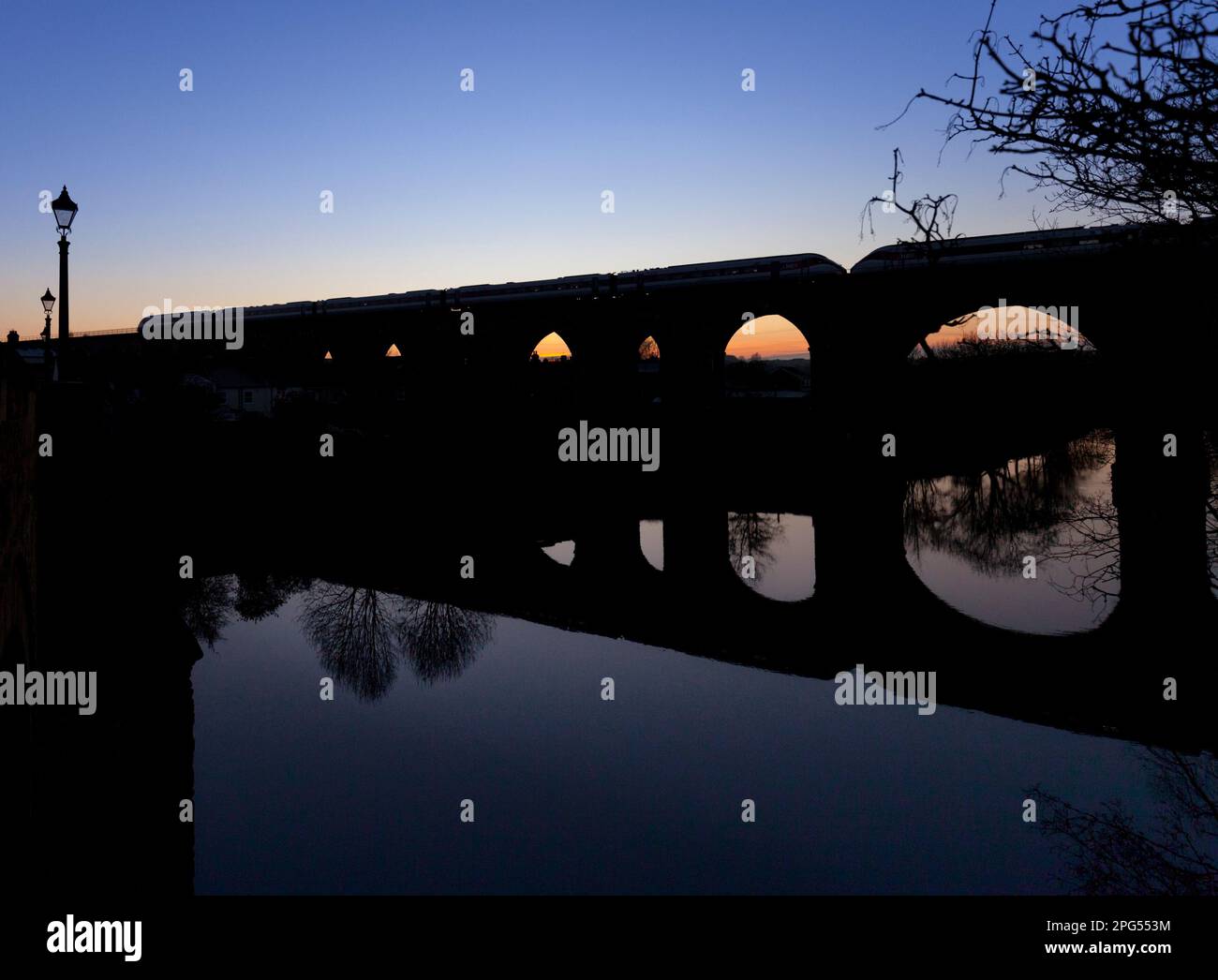 LNER Hitachi Azuma train crossing Yarm viaduct above the river Tees at ...