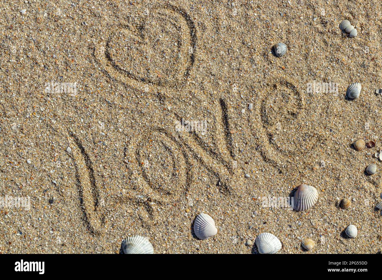 love message written in sand Stock Photo - Alamy