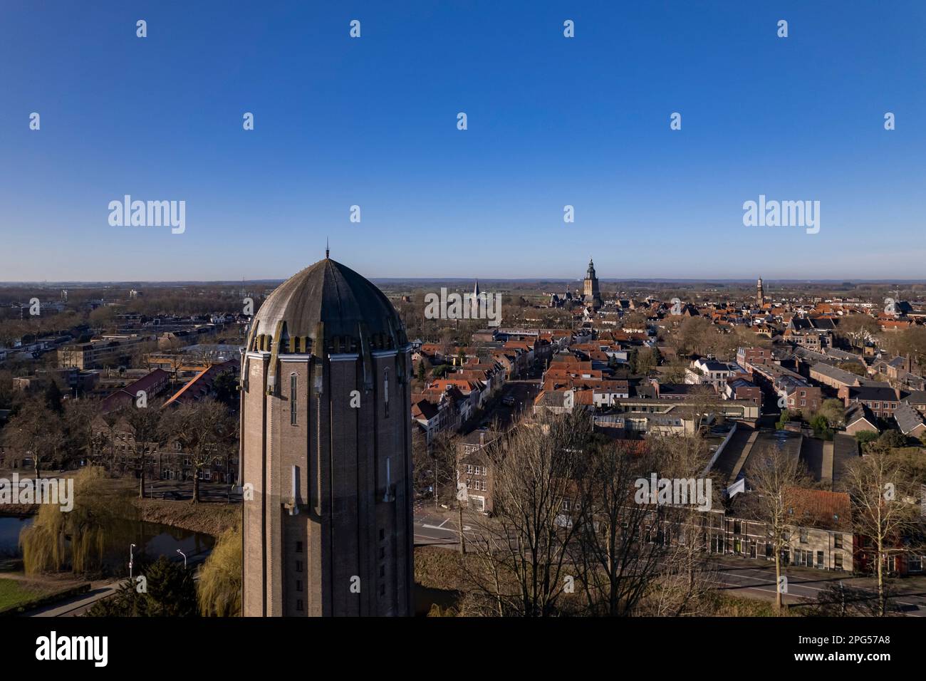 Aerial of former Dutch brick water tower in Zutphen now repurposed as a ...