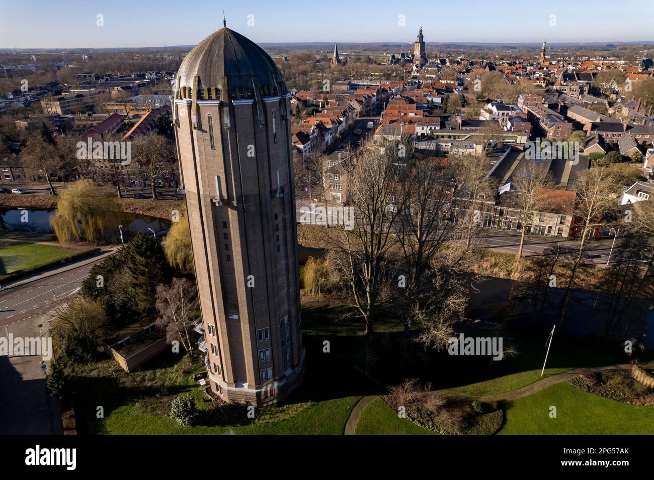 Water tower town Zutphen rising above field with cityscape of medieval ...