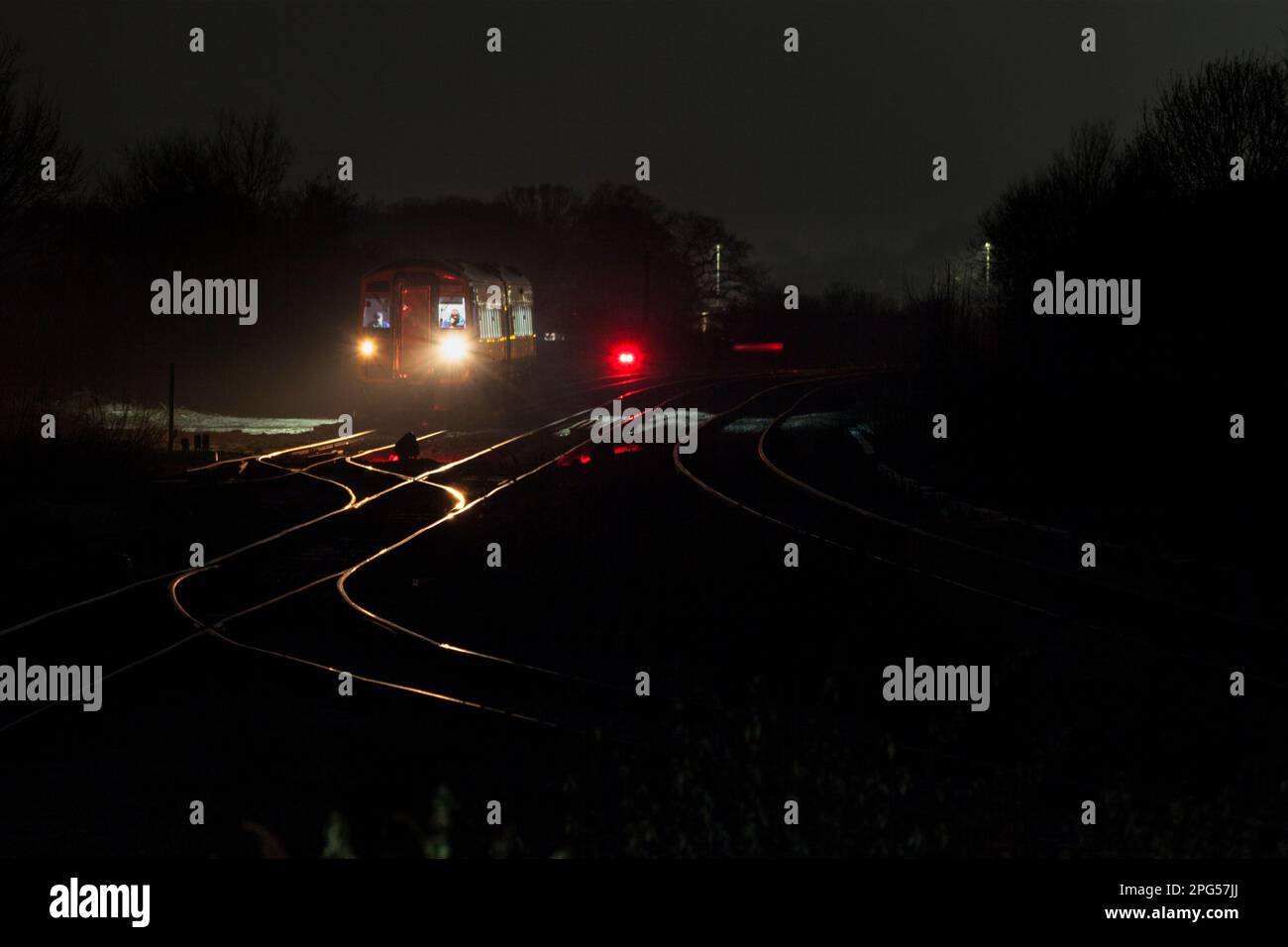 Northern Rail class 158 diesel trains headlights illuminating the track ...