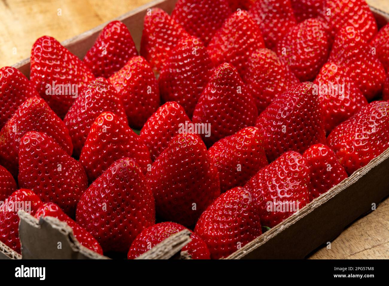 New harvest, 1 kilogram paper box of ripe red sweet Spanish strawberry ...