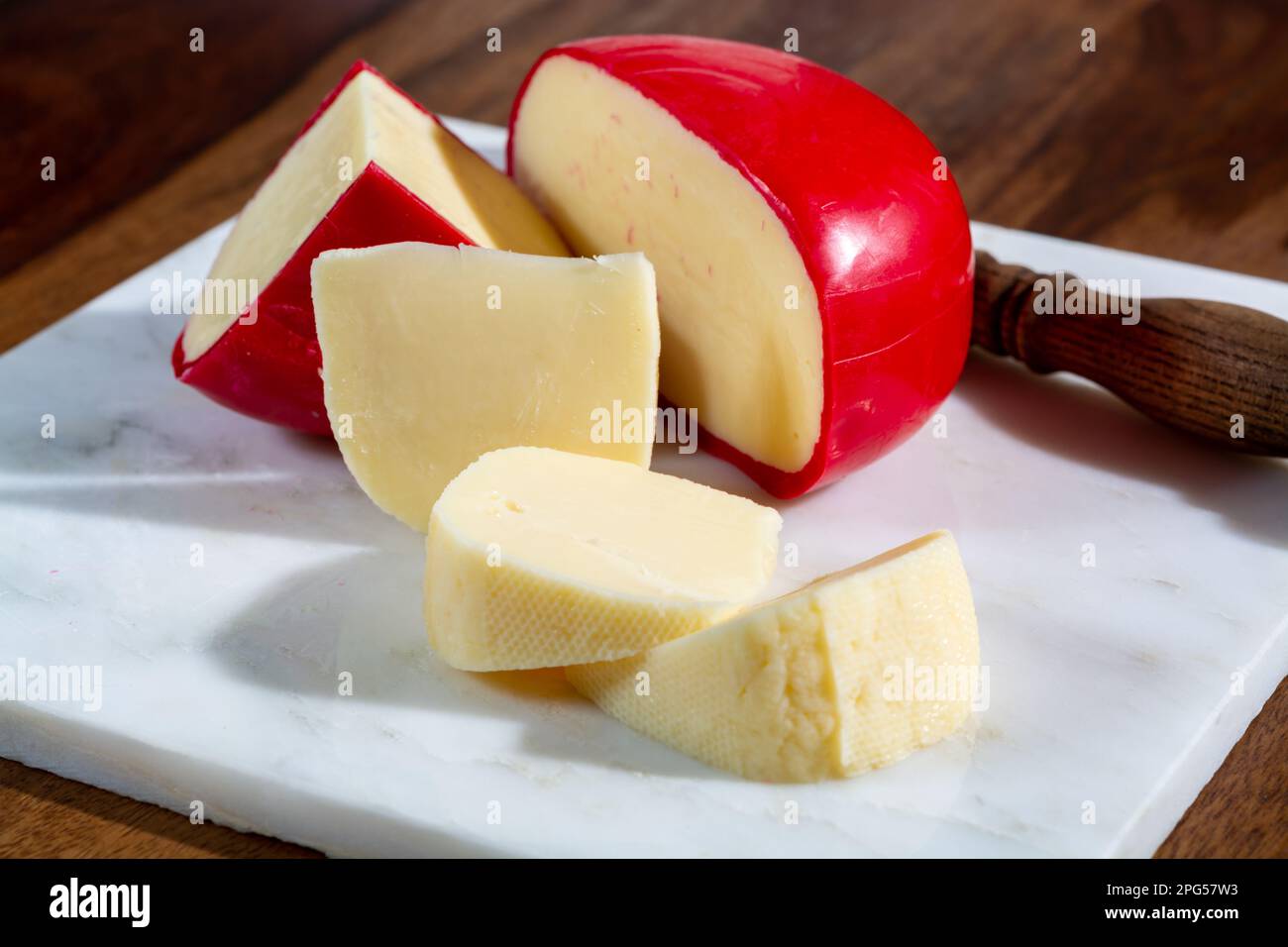 British red waxed original cheddar cheese madse from cow milk close up ...