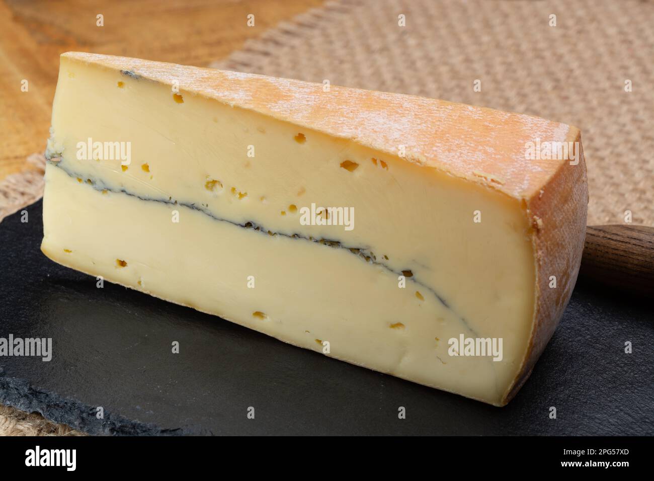 Cheese collection, French Morbier semi-soft cow milk cheese with black ...