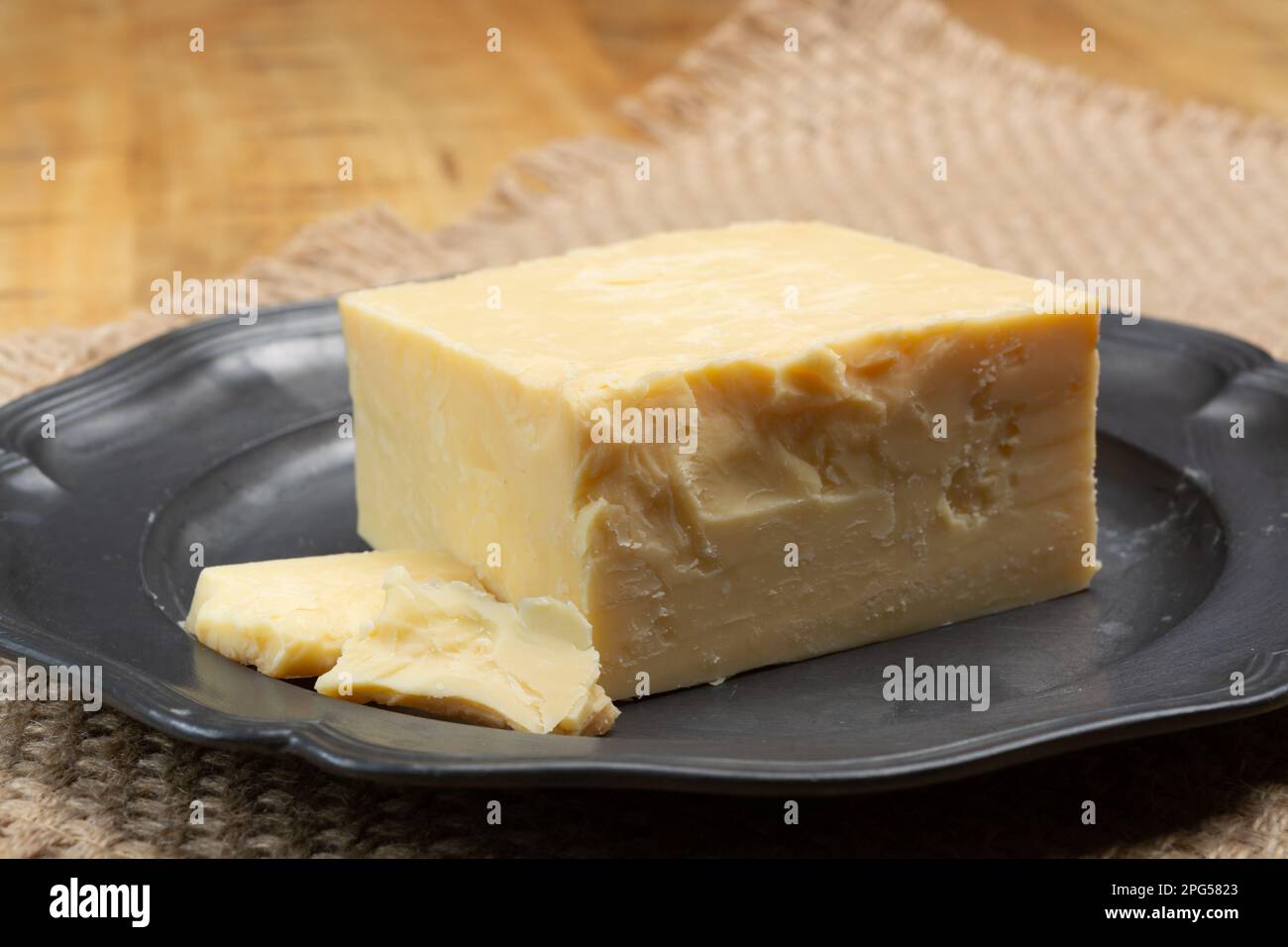 British cheeses collection, English matured smoked cheddar cheese close ...