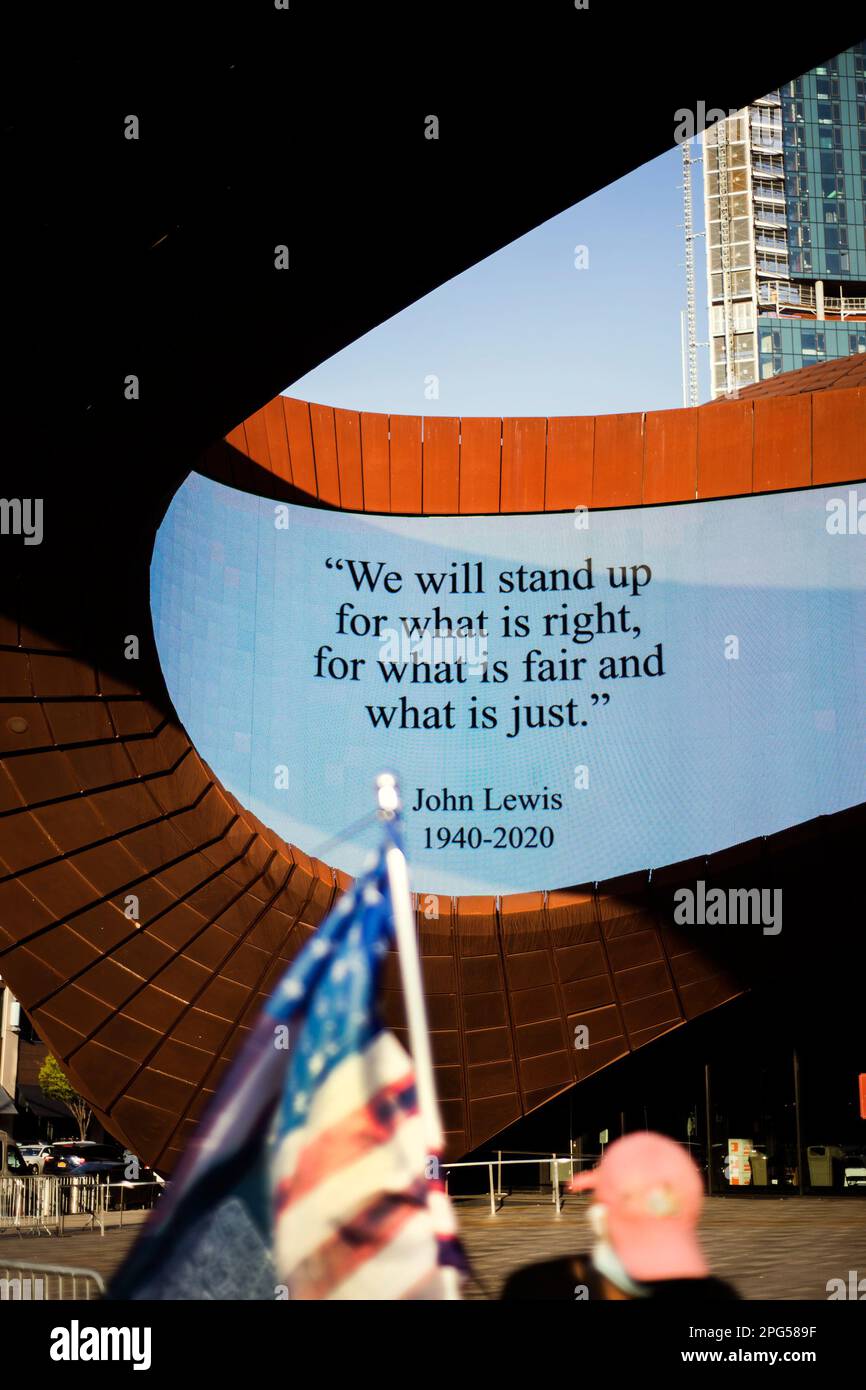 John Lewis Quote on digital sign with American flag in foreground ...