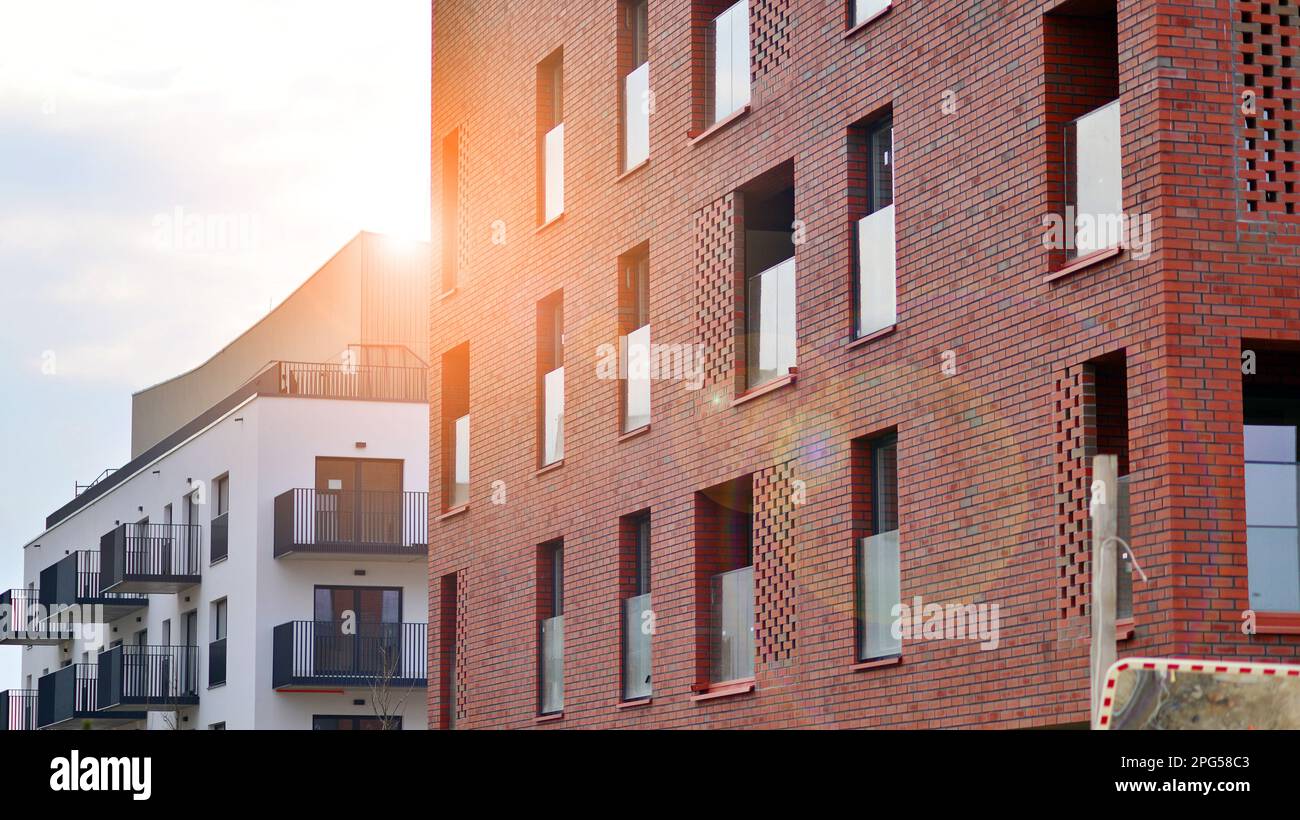 Modern apartment building for residential living in red brick stone ...