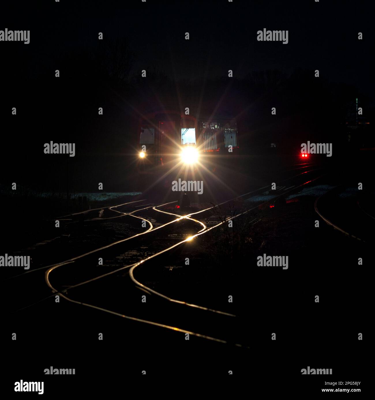 Northern Rail class 158 diesel trains headlights illuminating the track ...