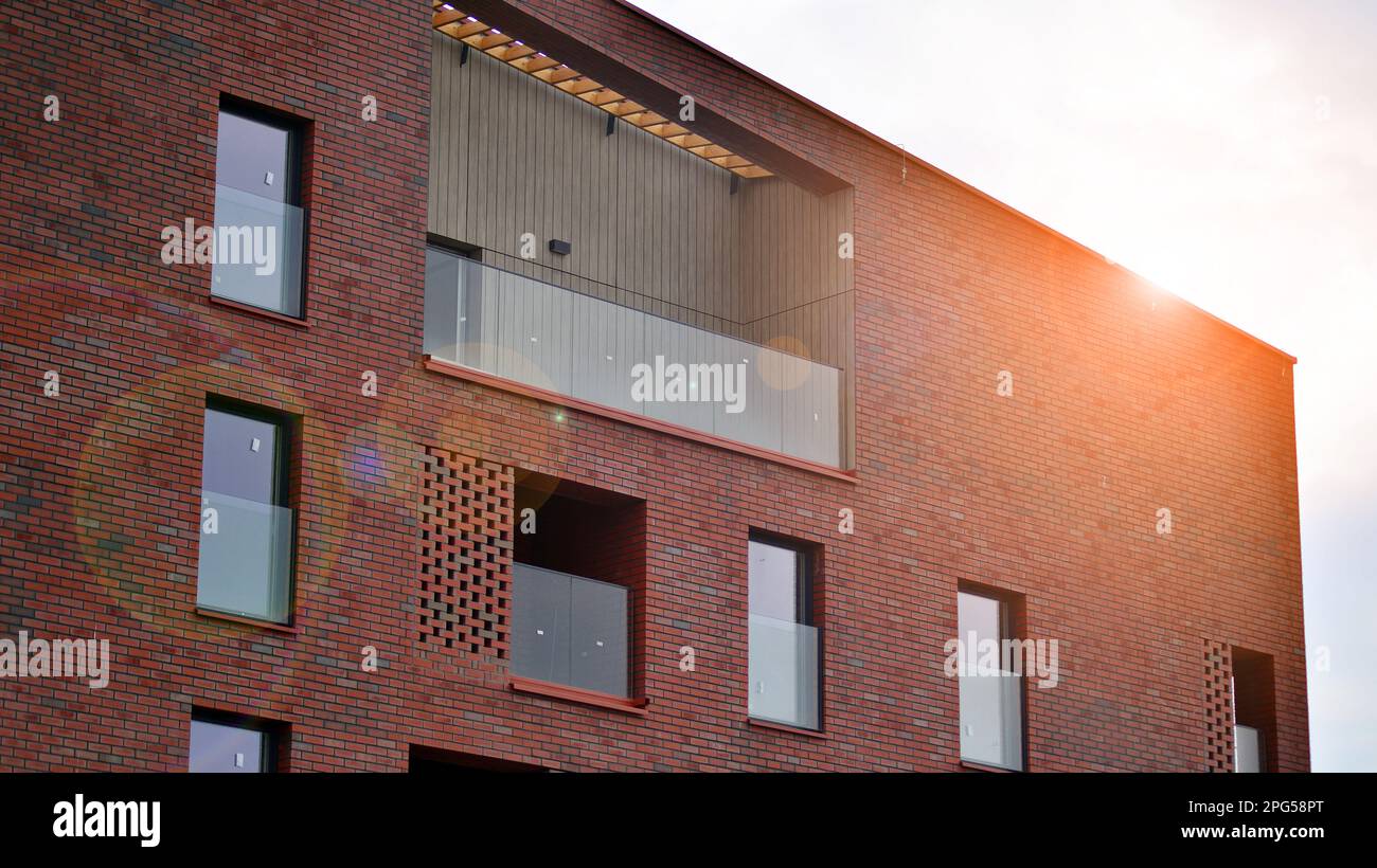 Modern apartment building for residential living in red brick stone ...