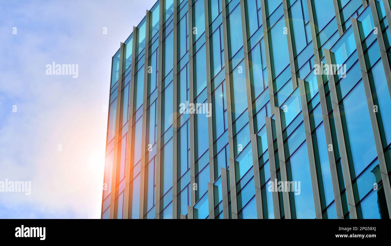 Blue background of glass commercial building, modern city of future ...