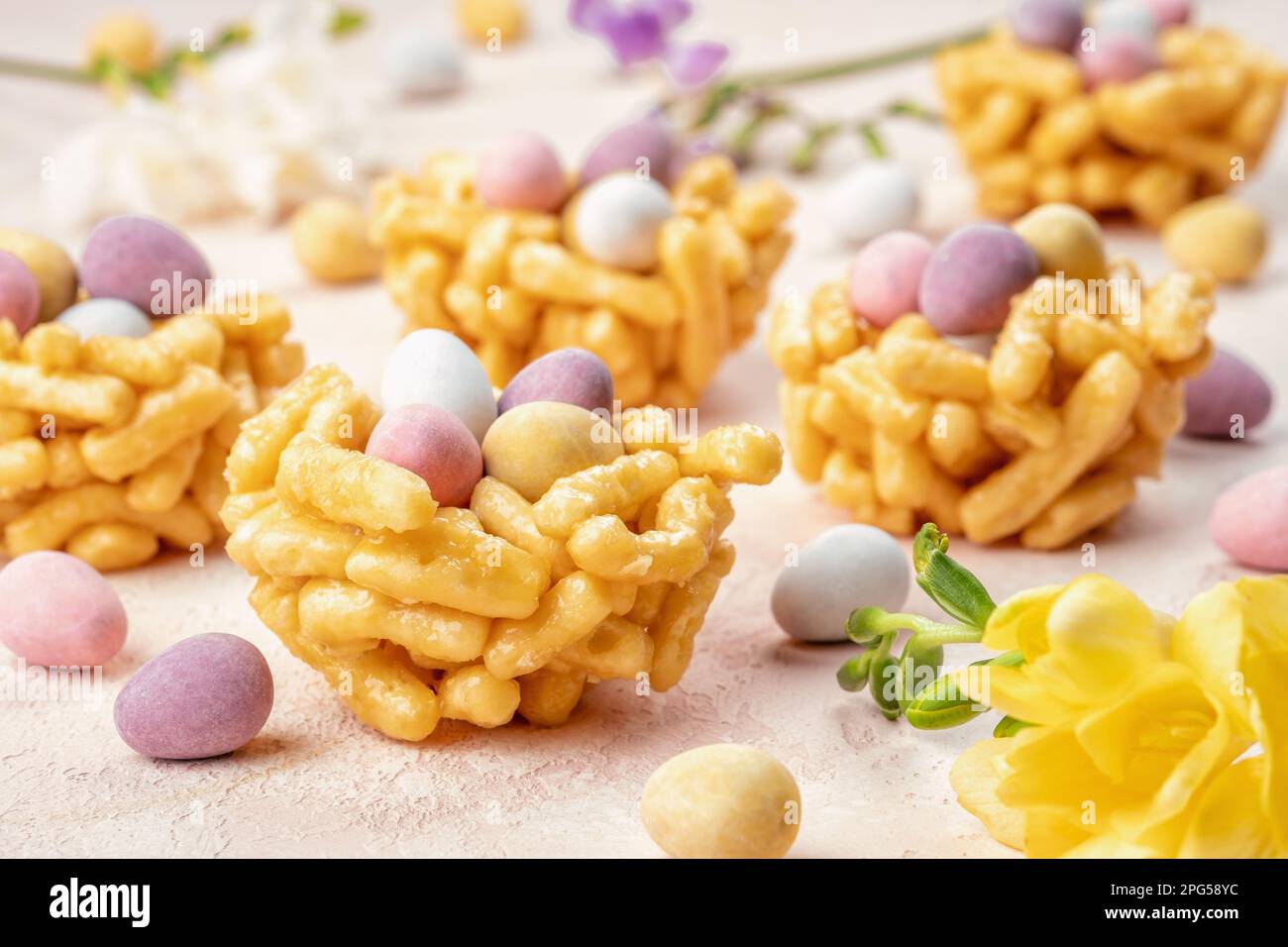 Springtime sweet nests filled with Easter eggs Stock Photo - Alamy