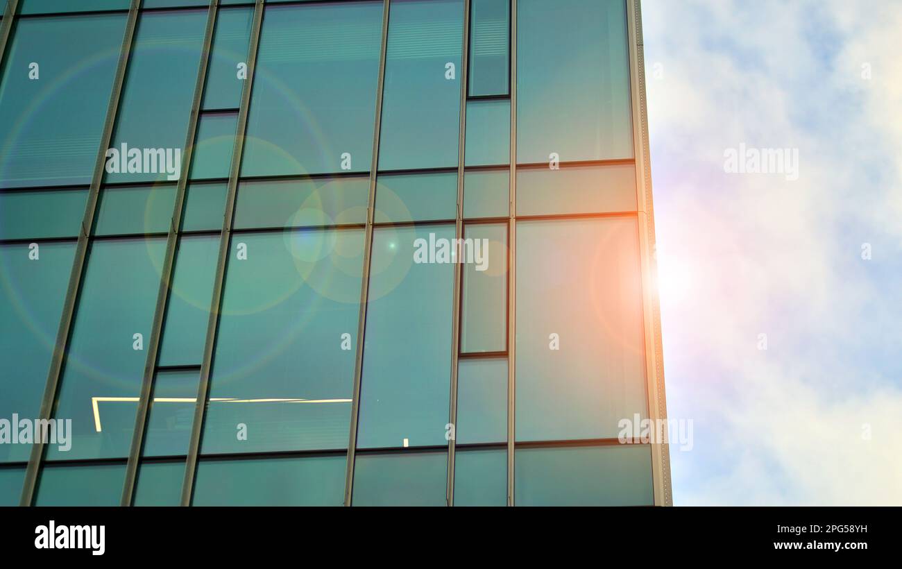 Blue background of glass commercial building, modern city of future ...