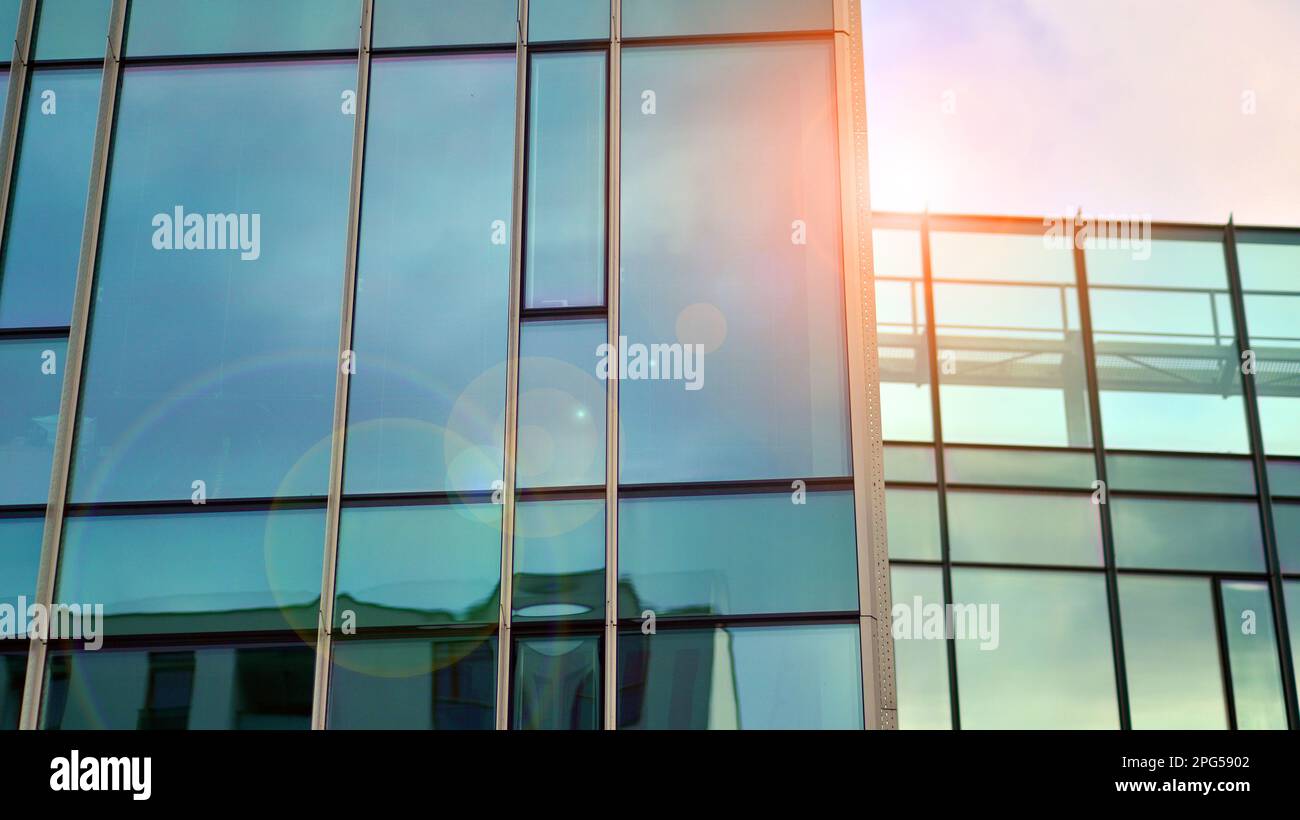 Blue background of glass commercial building, modern city of future ...