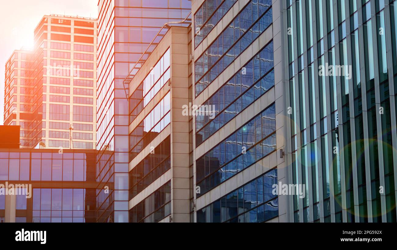 Blue background of glass commercial building, modern city of future ...