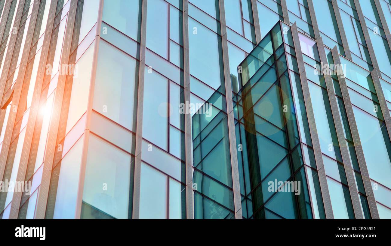 Blue background of glass commercial building, modern city of future ...