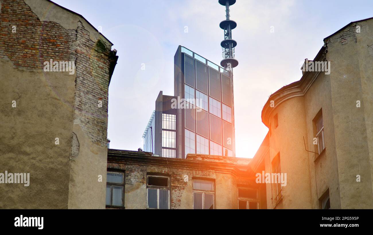 Contrast of old and new buildings in downtown . An ancient building ...