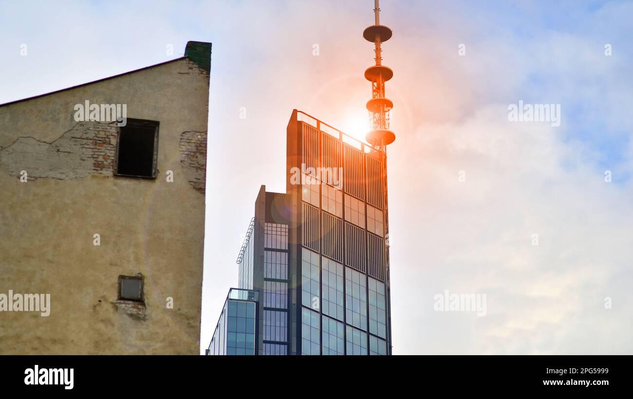 Contrast of old and new buildings in downtown . An ancient building ...