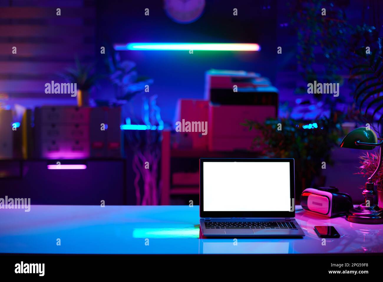 Neon metaverse futuristic concept. modern office with desk, laptop ...