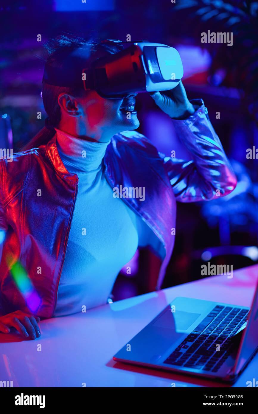 Neon metaverse futuristic concept. curious stylish female in virtual ...