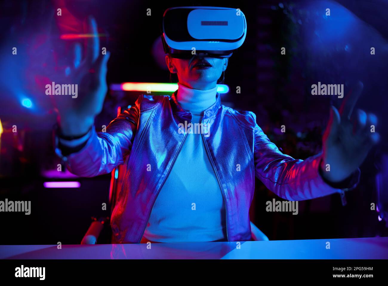 Neon metaverse futuristic concept. modern middle aged woman in virtual ...