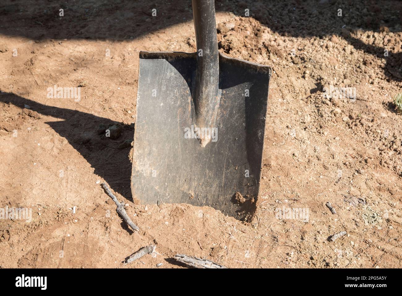 Spade stuck in the ground hi-res stock photography and images - Alamy