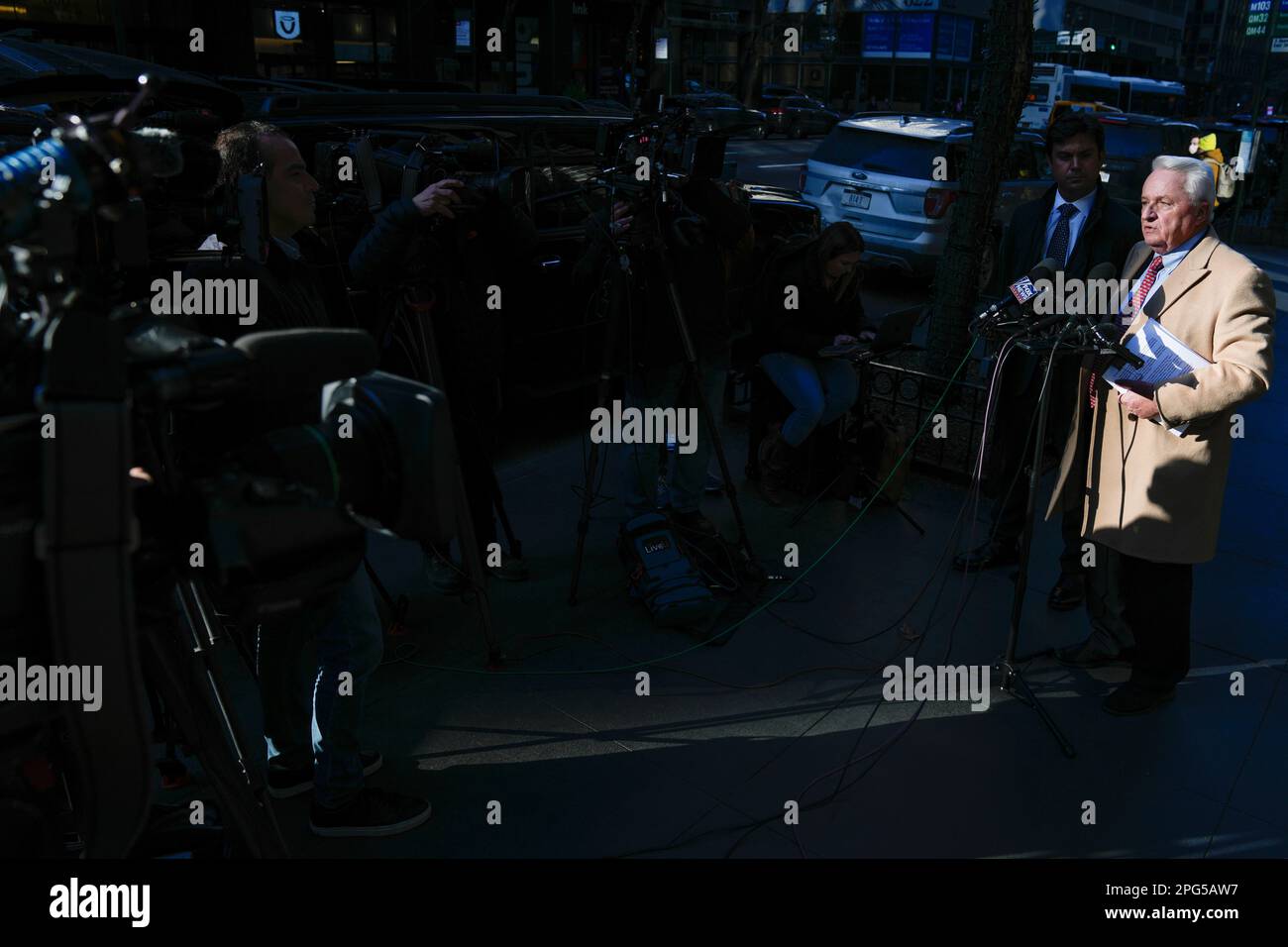 Attorney Bob Costello, right, talks to reporters after testifying ...