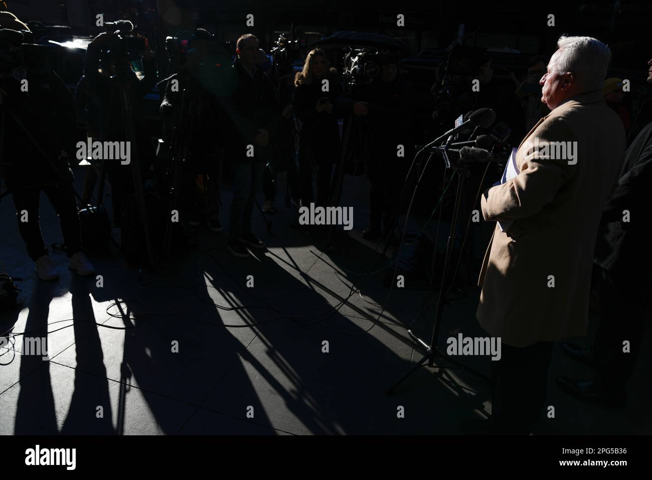 Attorney Bob Costello, right, talks to reporters after testifying ...