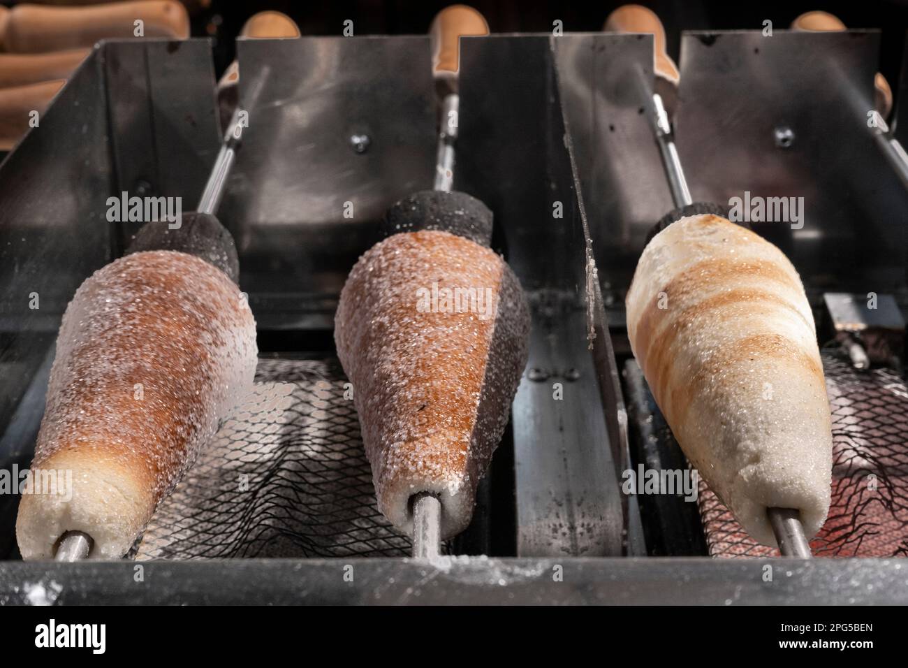 Trdelniks been cooked at the street of Prague. A Trdelnik or as it is ...
