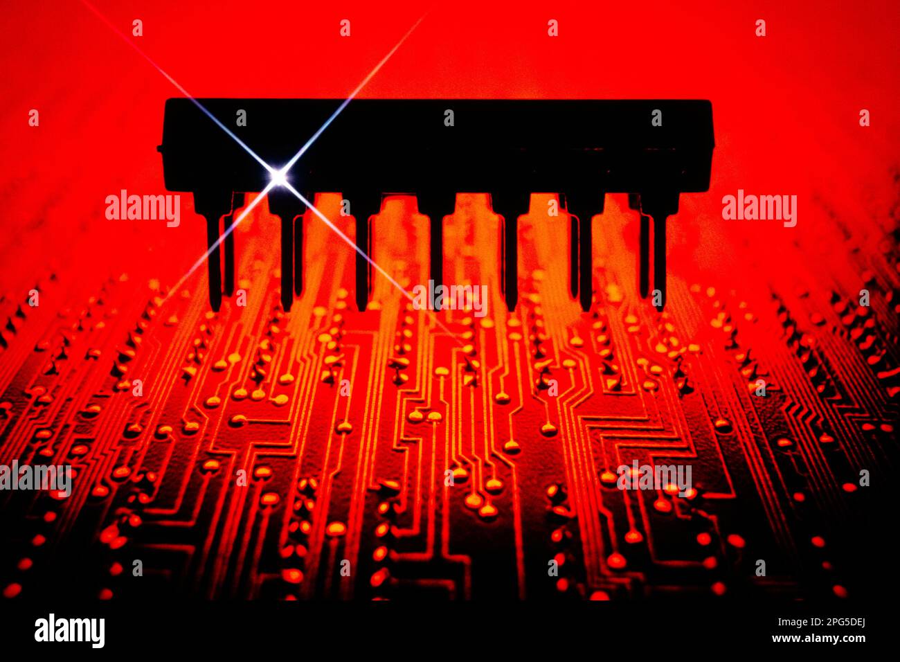 1980s INTEGRATED CIRCUIT OVER PRINTED CIRCUIT WITH STARBURST LIGHT ...