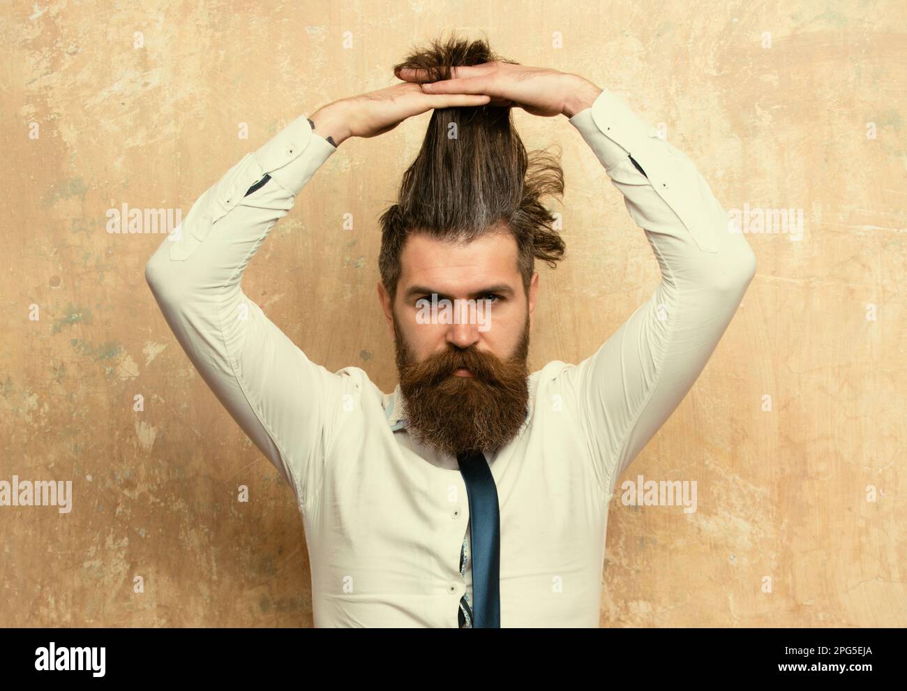 Funny hairstyle, modern haircut. Bearded man with beard, bearded gay ...