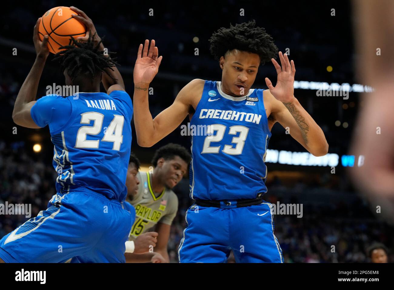 Creighton forward Arthur Kaluma (24) pulls iun a rebnound as Creighton ...
