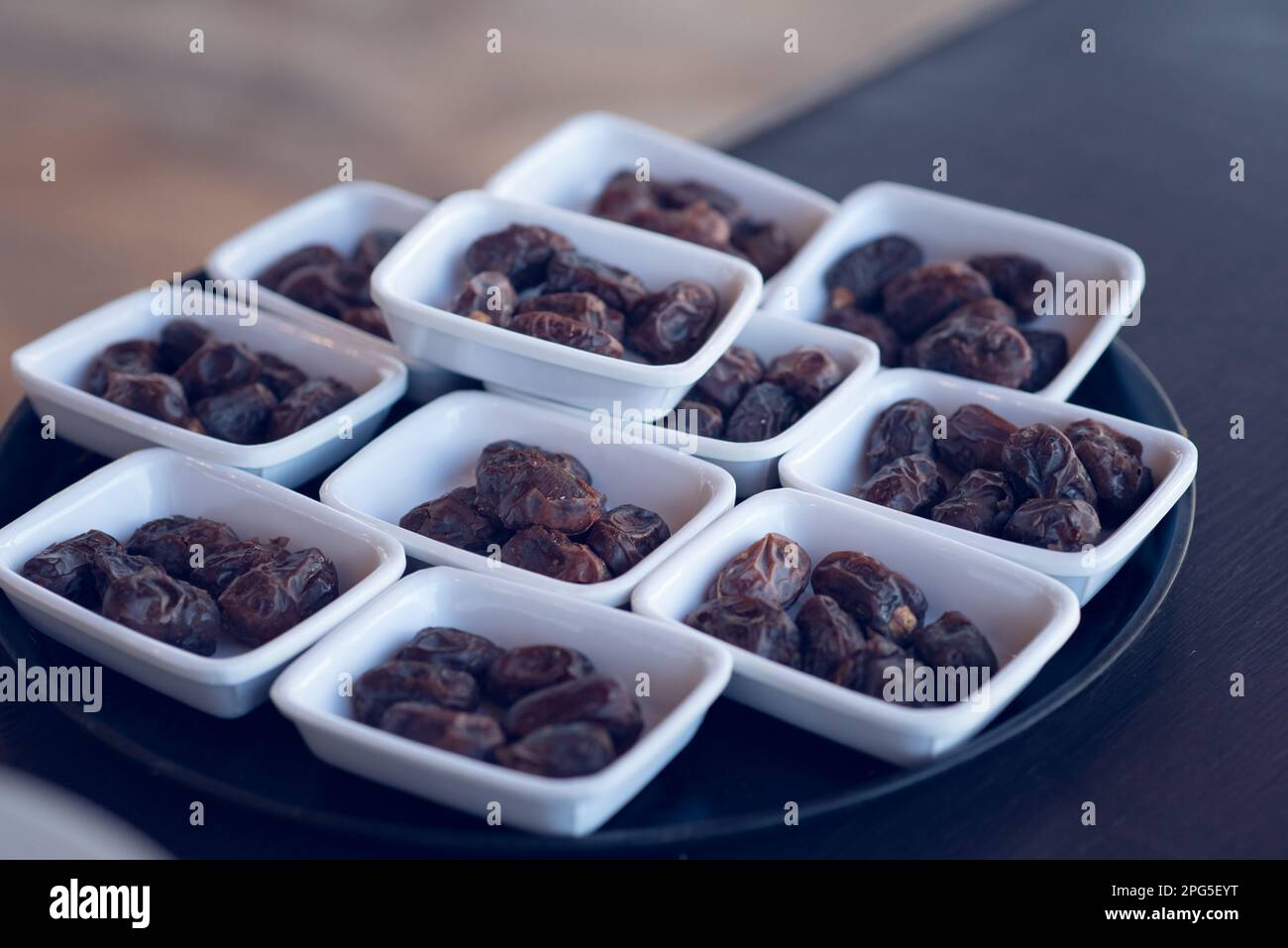 dates prepared in many small plates Stock Photo - Alamy
