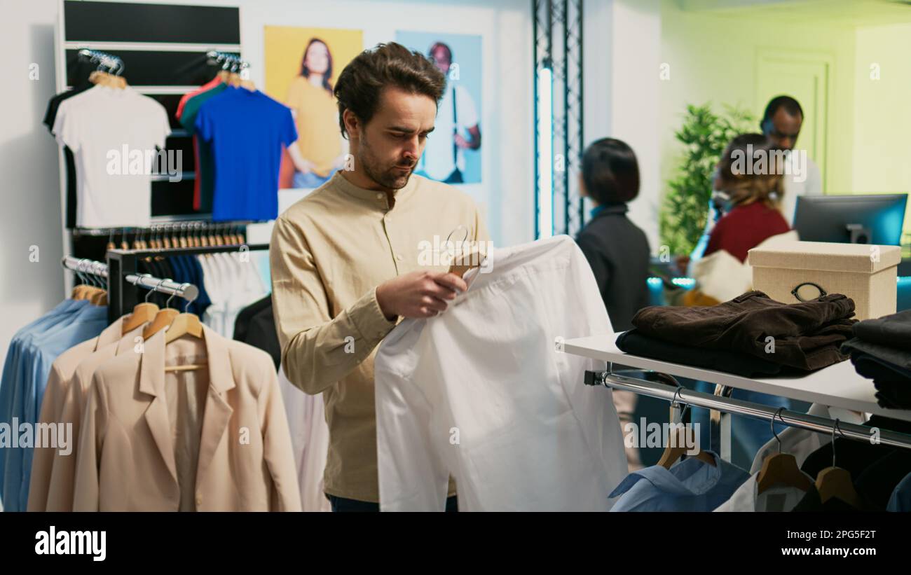 Male asian client clothing store hi-res stock photography and images ...