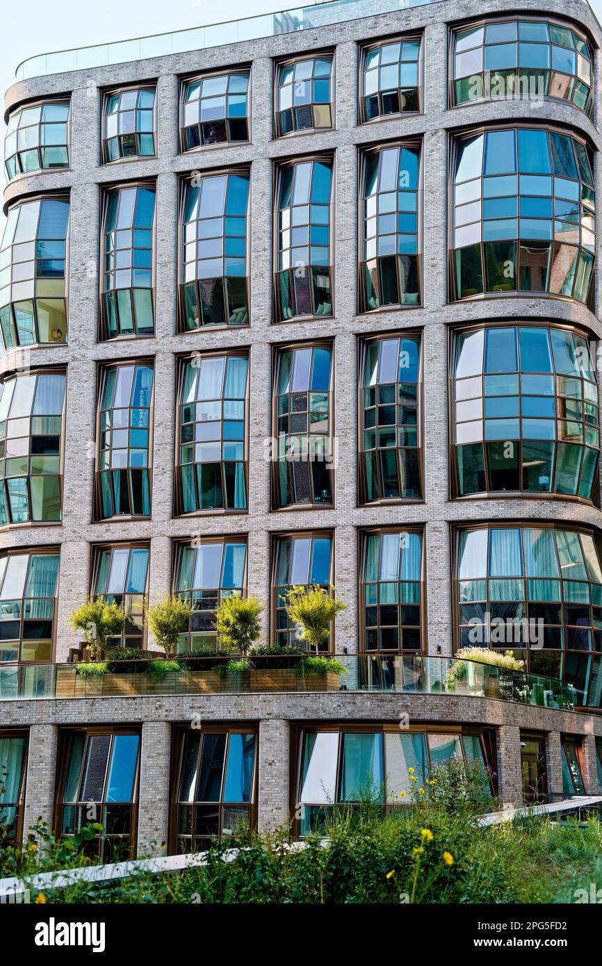 Trees on Office Balcony with Bay Windows Stock Photo - Alamy