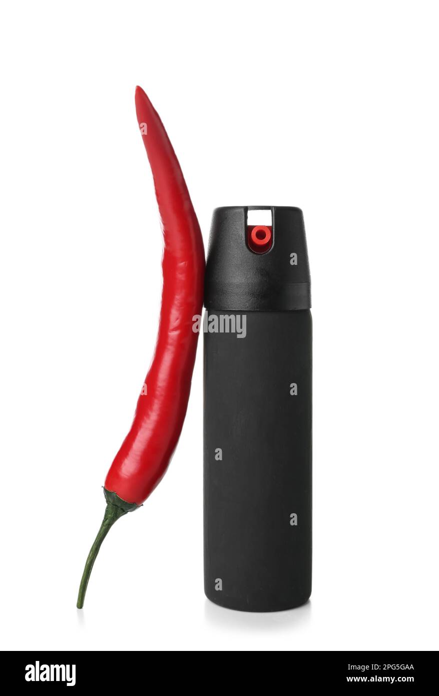 Spray with chili pepper on white background Stock Photo - Alamy