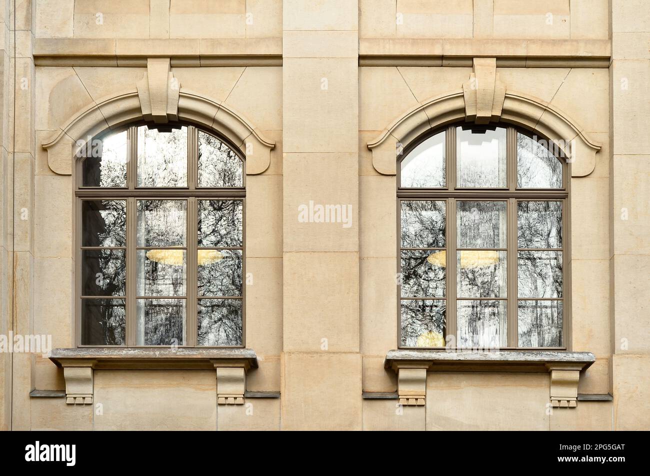 View of beautiful building with wooden windows Stock Photo - Alamy