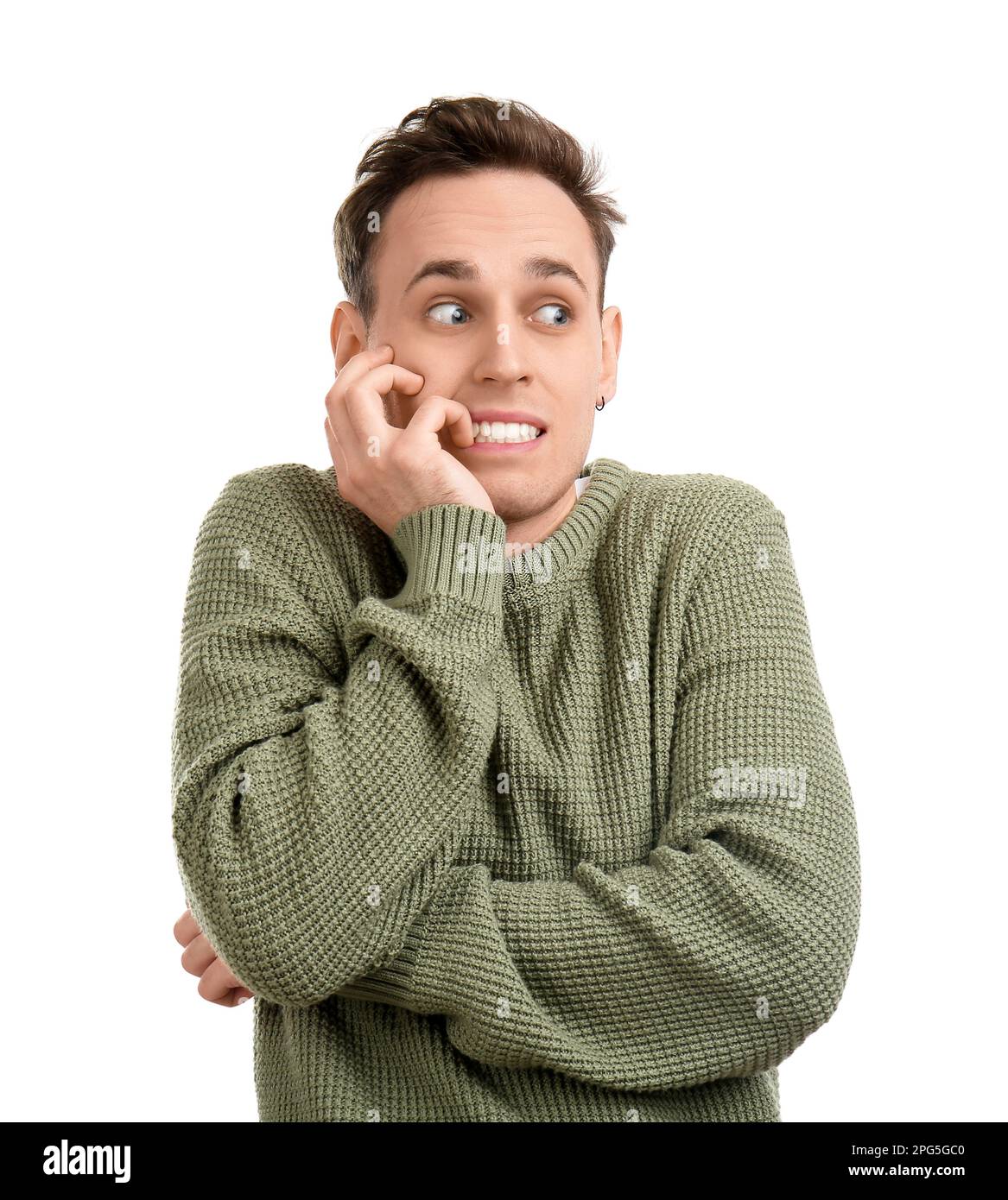 Scared young man on white background Stock Photo - Alamy